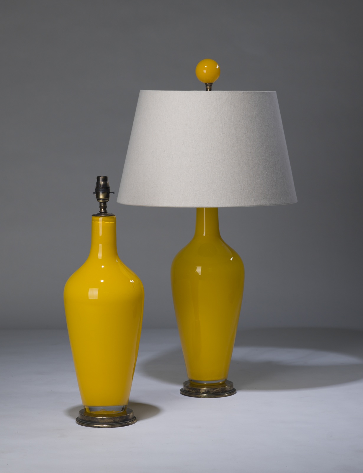 Pair Of Medium Light Orange Yellow 'standard' Glass Lamps On Distressed ...