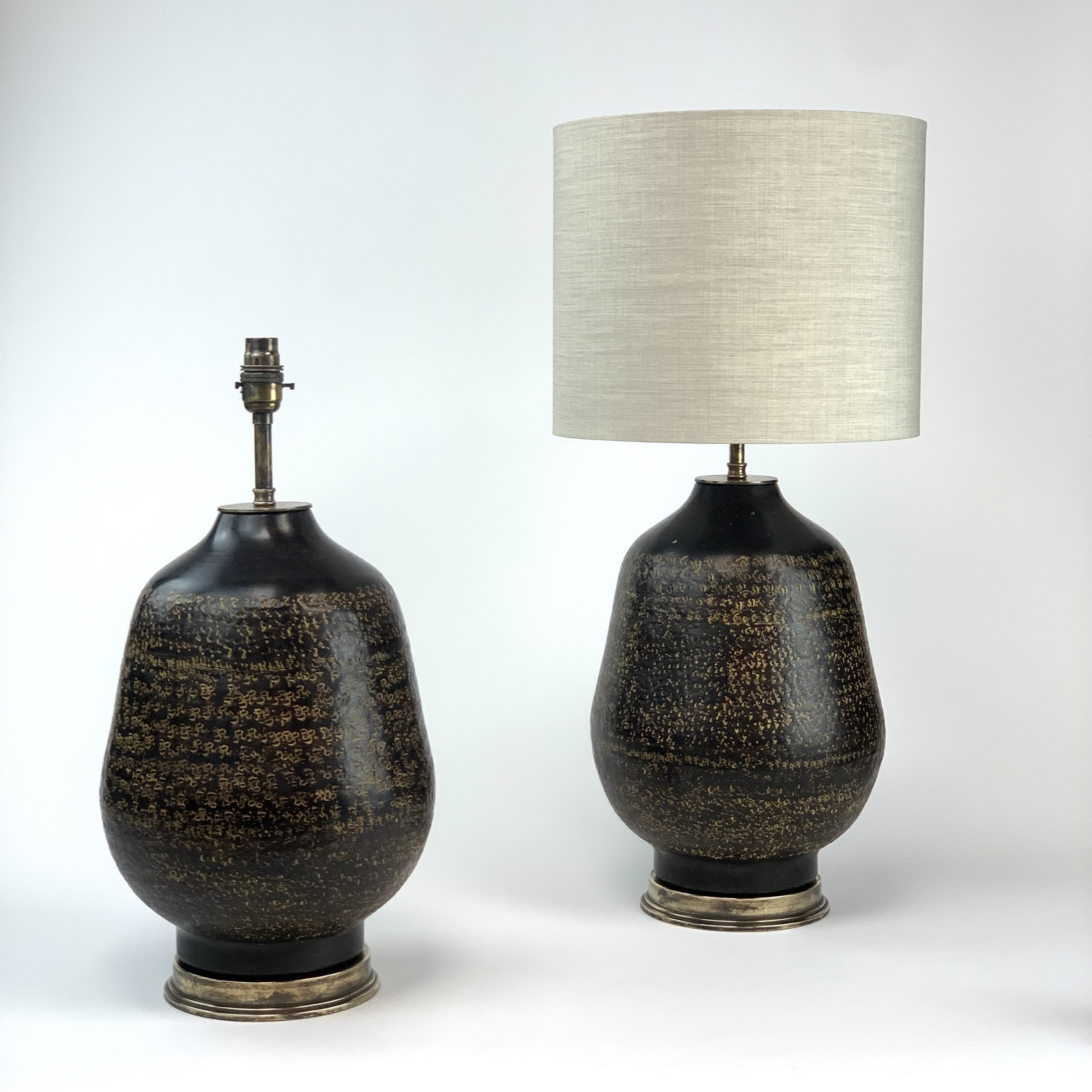 Pair Of Aztec Style Metal Lamps On Antique Brass Bases (T6705) - TYSON ...
