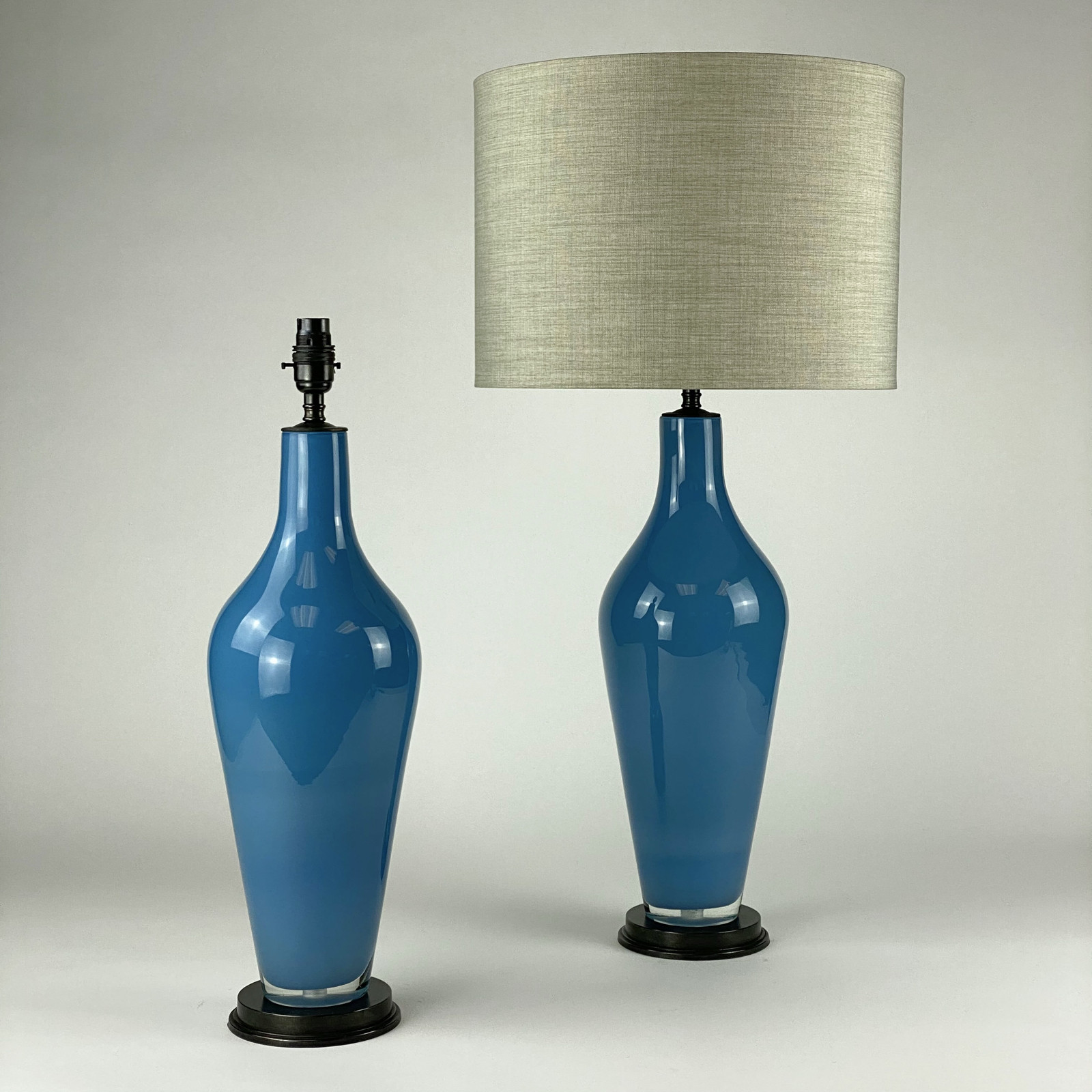 Pair Of Medium Sky Blue standard Glass Lamps On Brown Bronze Bases Pair Of Medium Sky Blue standard Glass Lamps On Brown Bronze Bases